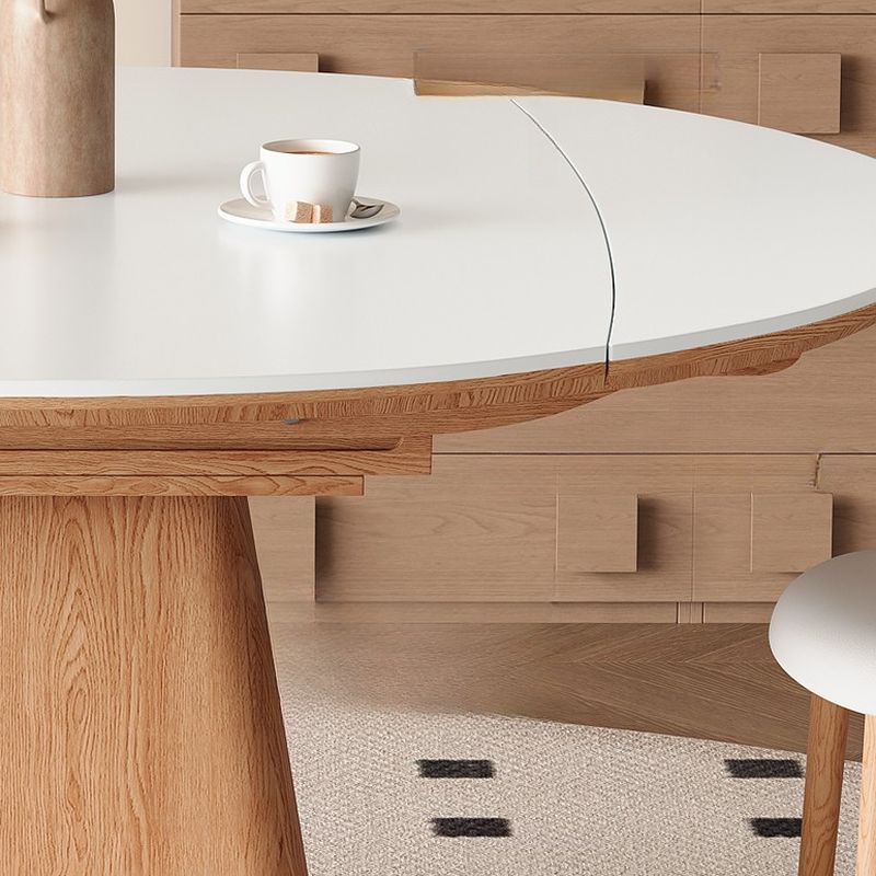 Simplistic Circular Dining Table with Slate Stone Top, Concealed Leaf ...